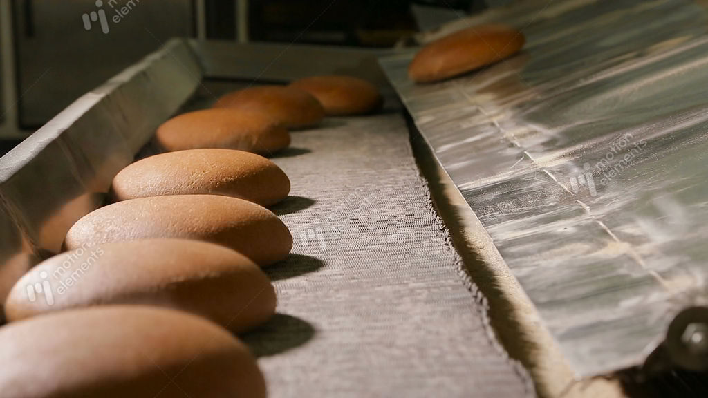 Hot Steaming Bread Out Of The Oven At The Bakery Stock video footage ...