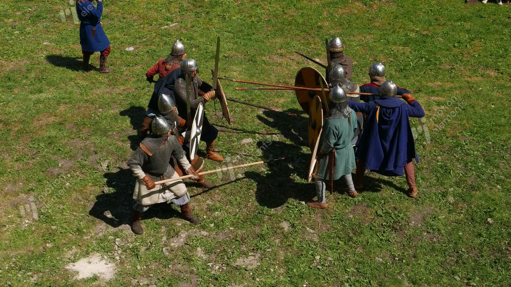 Warriors In Two Groups Fight By Spear And Defend Using Round Shield ...