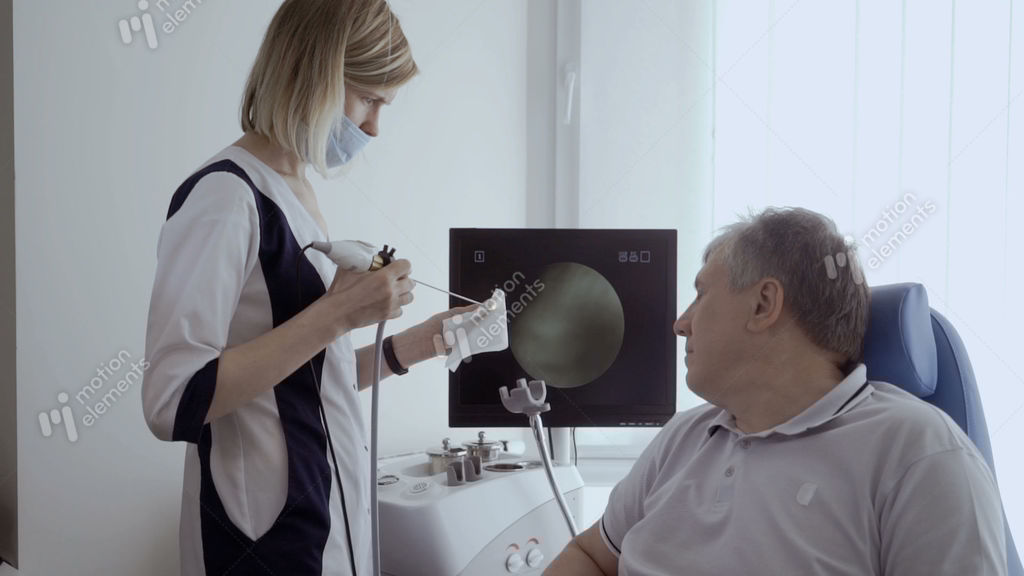 Doctor Check Nose Of Senior Man With ENT Telescope Stock video footage ...