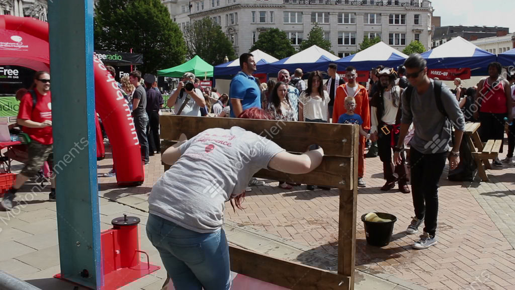 Wet Sponge Throwing Game-woman In The Stocks- Zombie Festival Stock ...